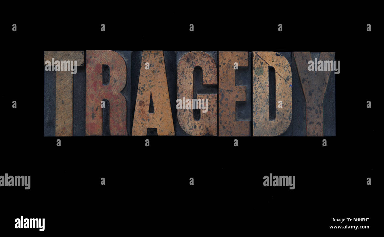 the word tragedy in ink-stained letterpress wood Stock Photo - Alamy