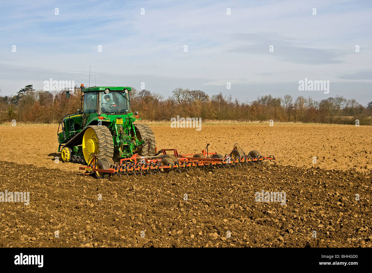 Farming in Lincolnshire - John Deer track tractor pulling soil ...