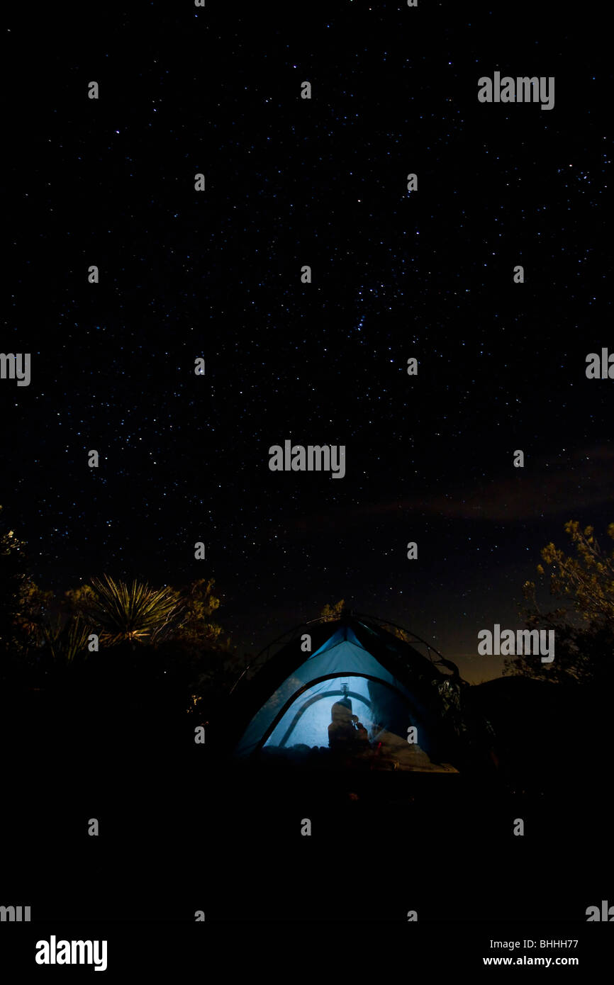 Tent lit from inside under night sky hi-res stock photography and ...
