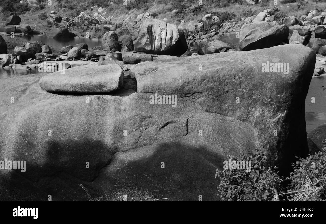 Rock formations by the river Tungabhadra in Hampi, India Stock Photo ...
