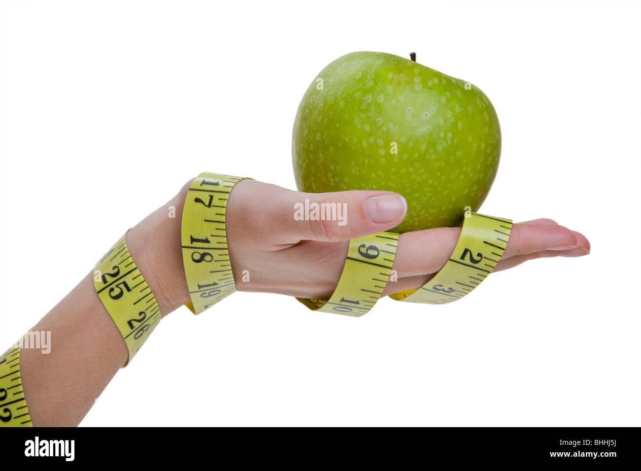 Diet hand conceptual shot over white Stock Photo - Alamy