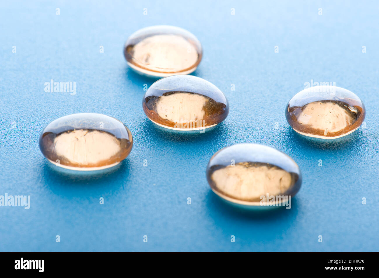 object on blue - Glass drop close up Stock Photo - Alamy