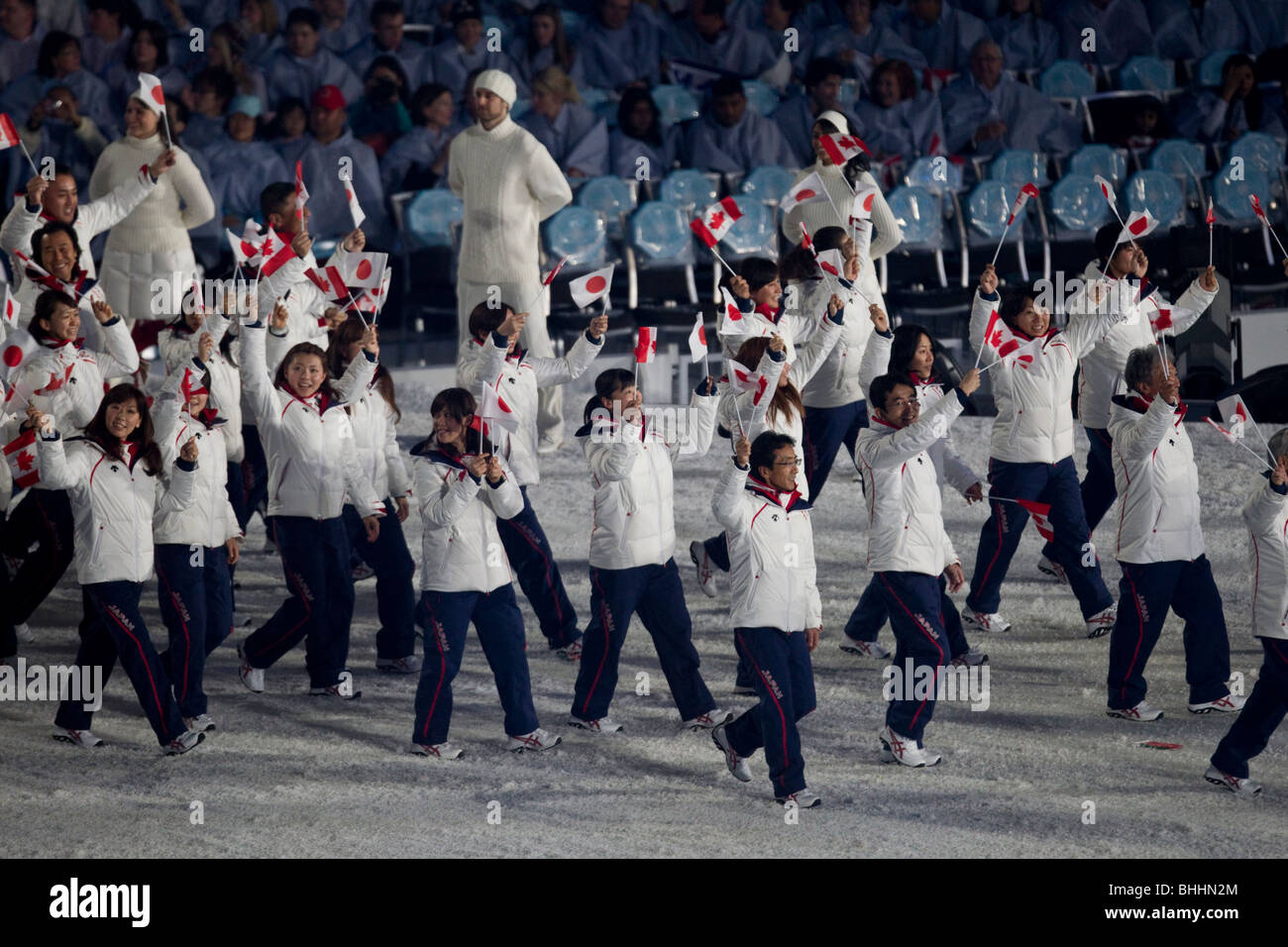 Japanese athletes marching in at the opening ceremonies of the 2010 ...