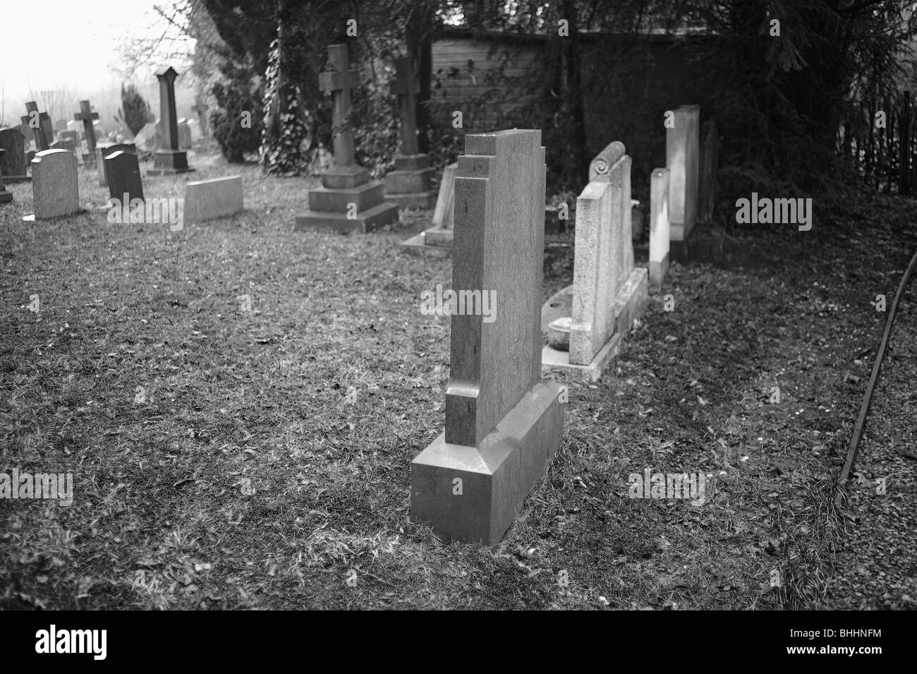 gravestones in a country cemetery Stock Photo - Alamy