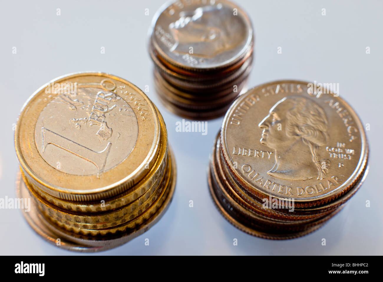 Dollar euro coins hi-res stock photography and images - Alamy