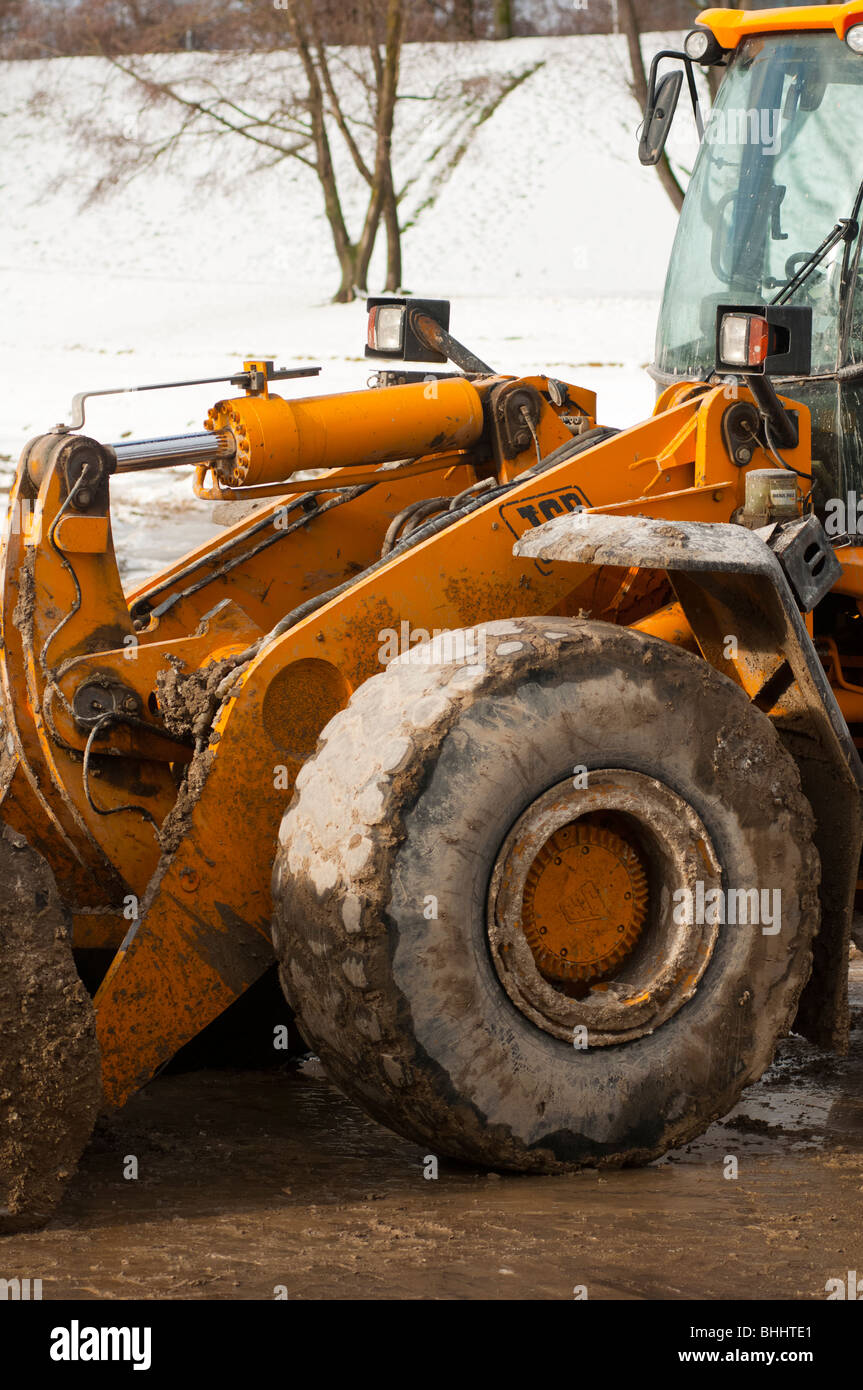 Bulldozer deep in mud Stock Photo - Alamy