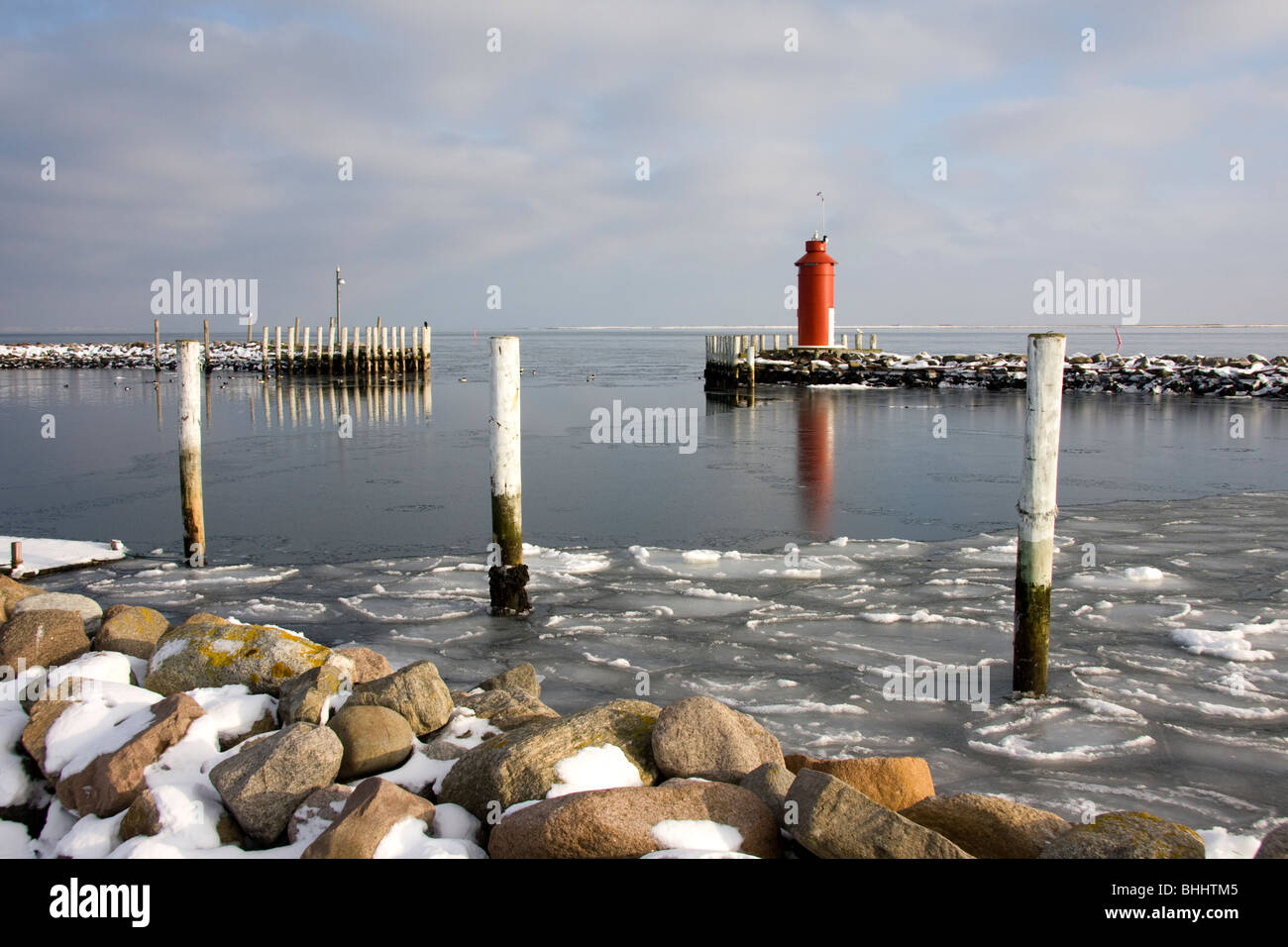 Lighthouse and harbor entry Stock Photo - Alamy