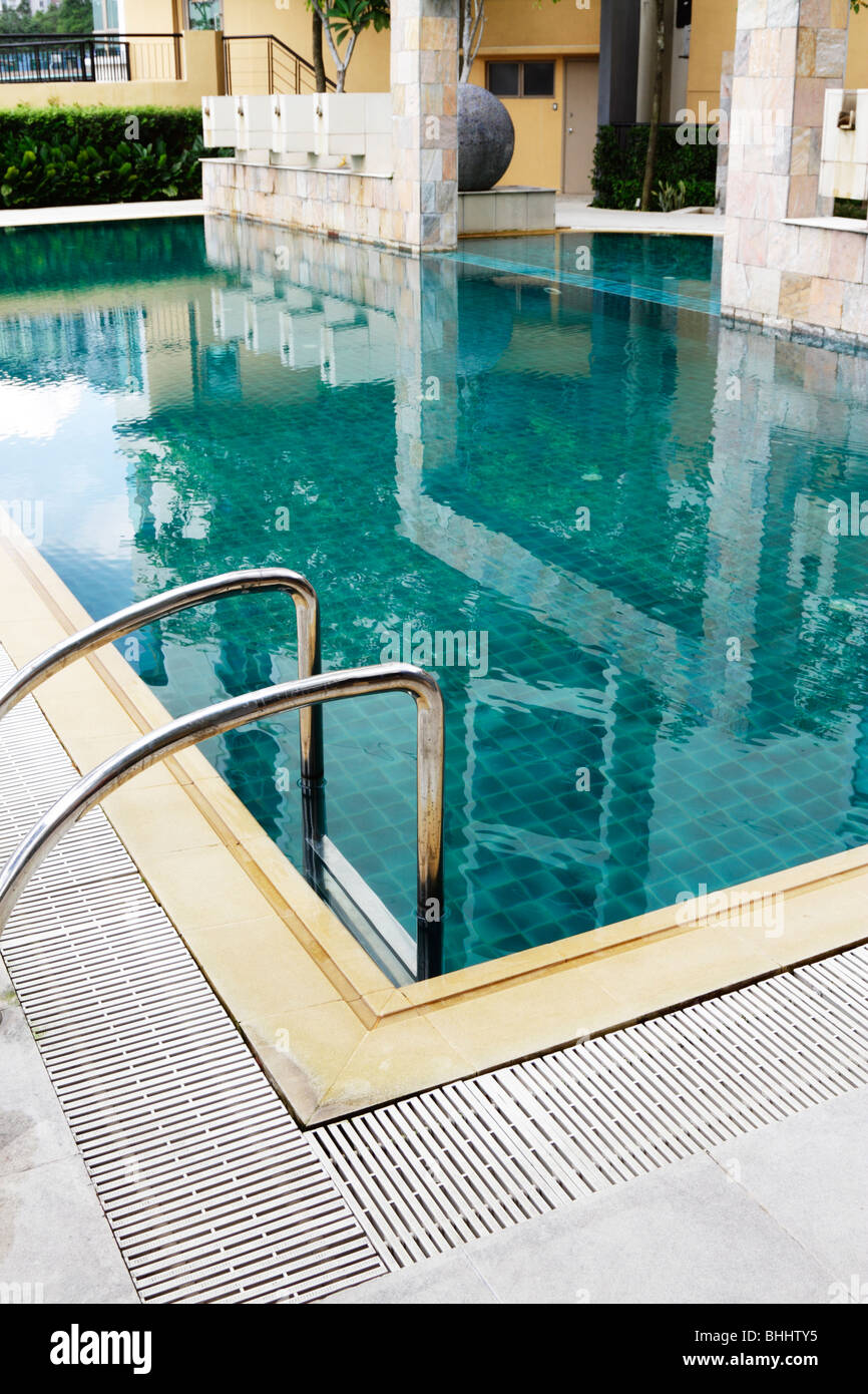 Poolside view of an apartment swimming pool Stock Photo - Alamy
