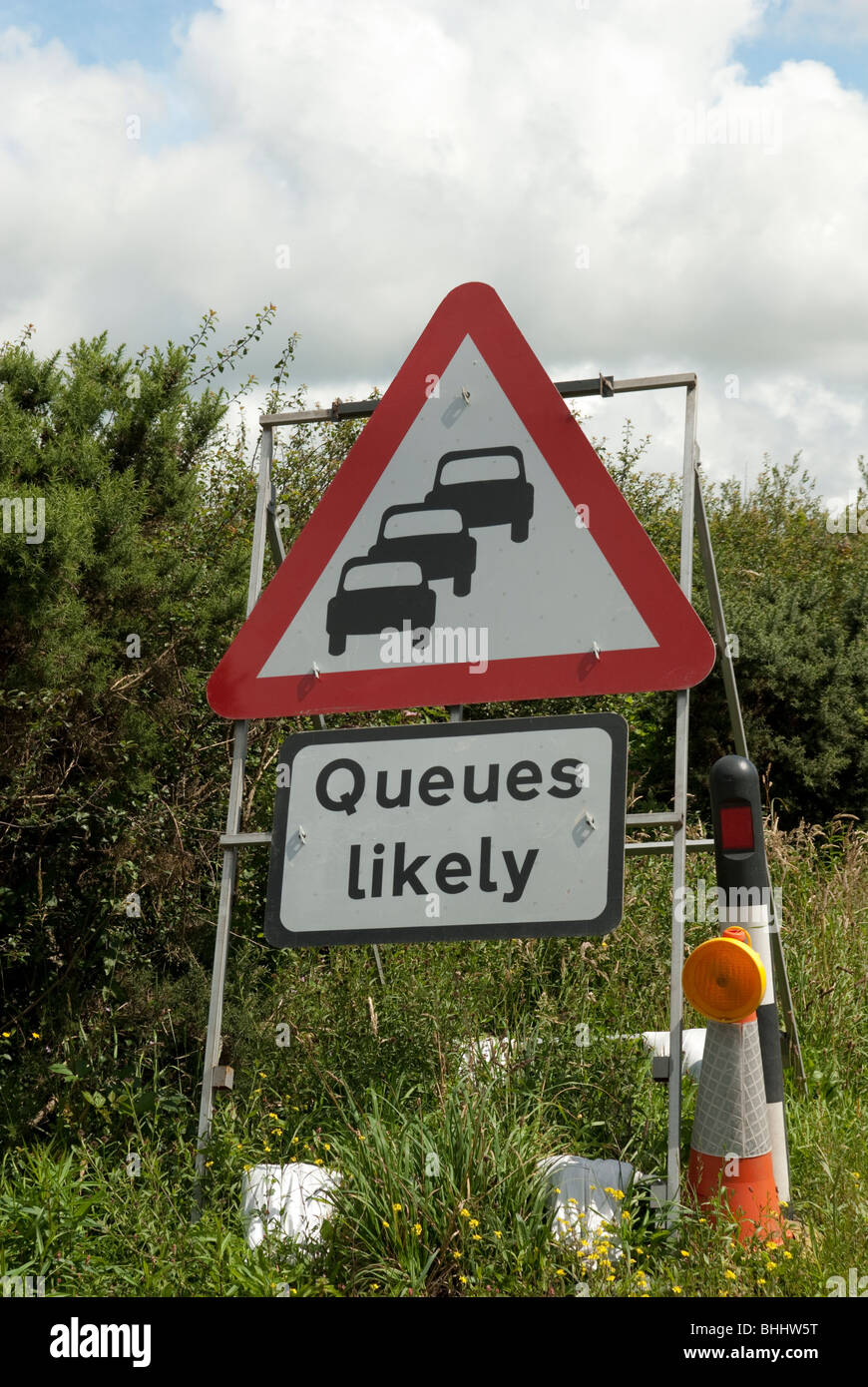 Queues Likely traffic warning sign Stock Photo - Alamy