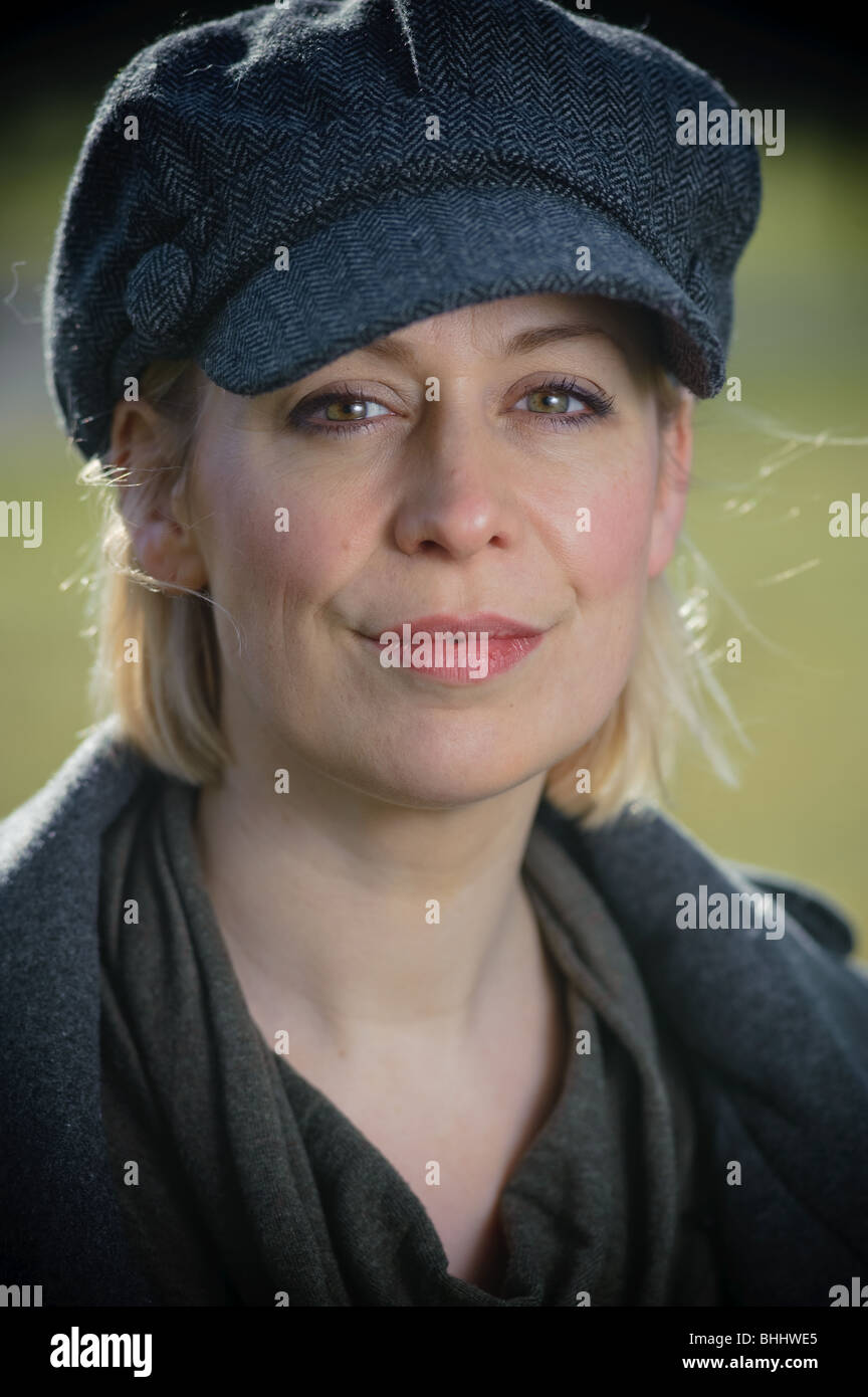Blond woman in cap outdoor portrait Stock Photo - Alamy