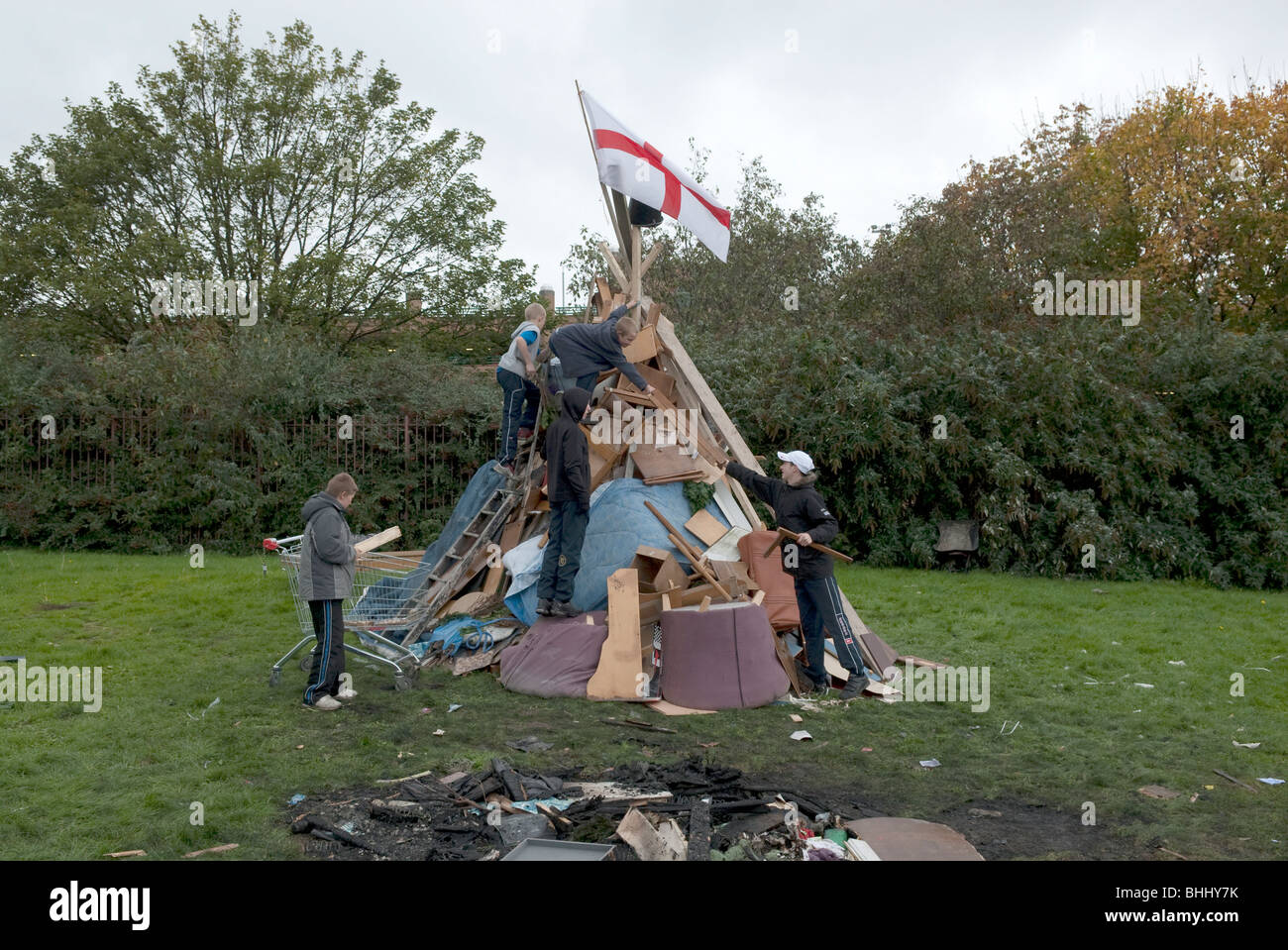 Young boys build bonfire for Guy Fawkes Celebrations Stock Photo - Alamy