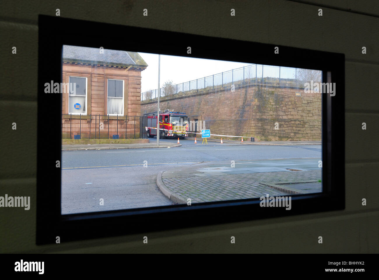 fire engine seen through window of engine house door Stock Photo - Alamy