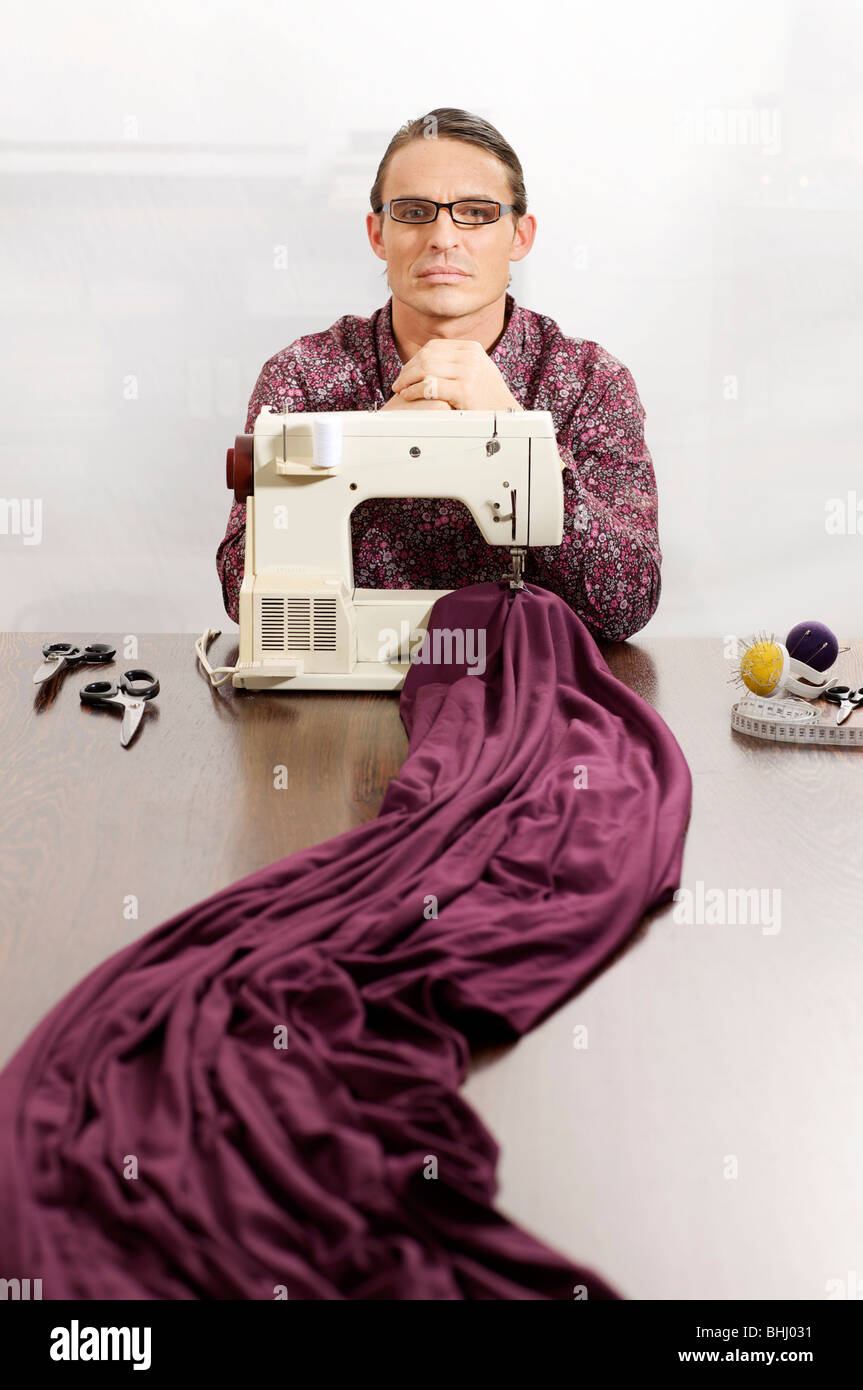 fashion designer tailoring Stock Photo - Alamy