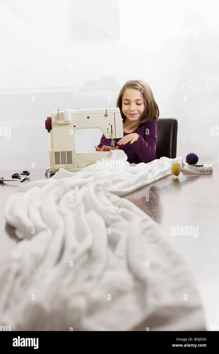 little tailor girl practicing Stock Photo - Alamy