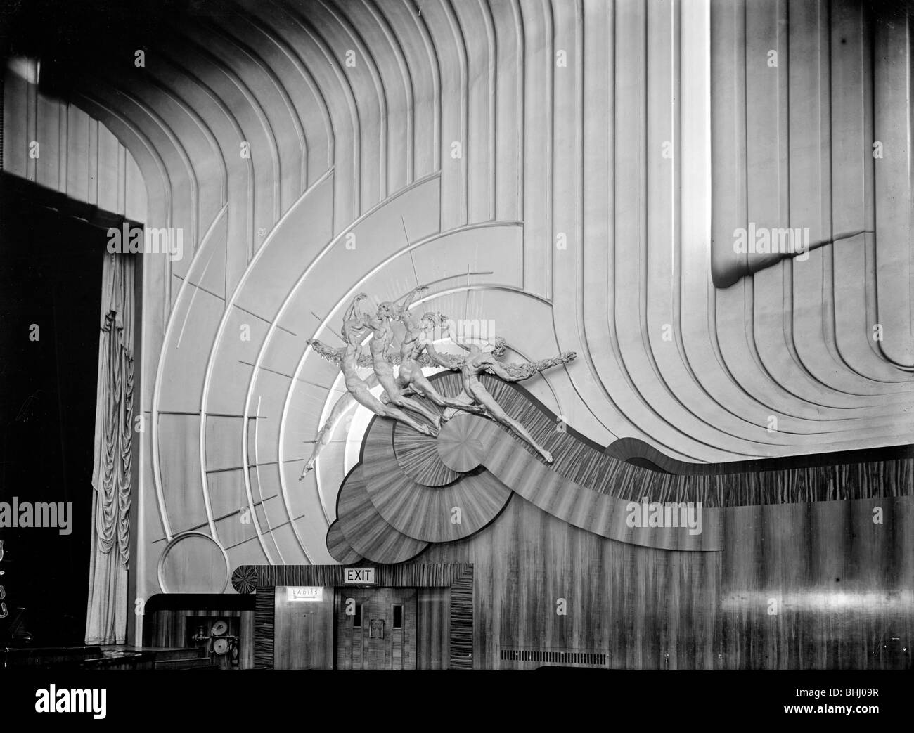 Detail of four relief figures at the Odeon, Leicester Square, London ...