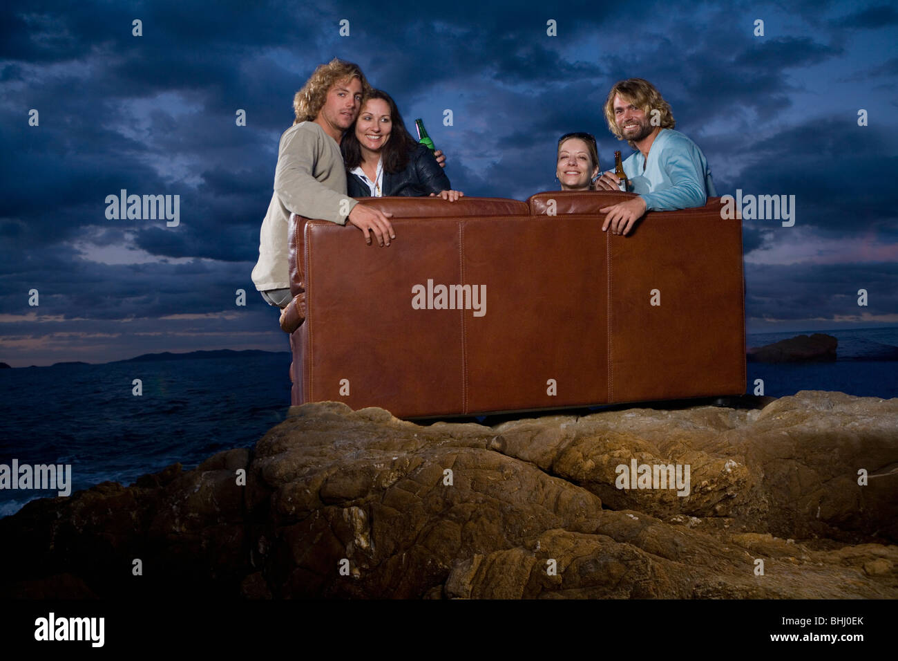 Couple sitting on sofa outside hi-res stock photography and images - Alamy