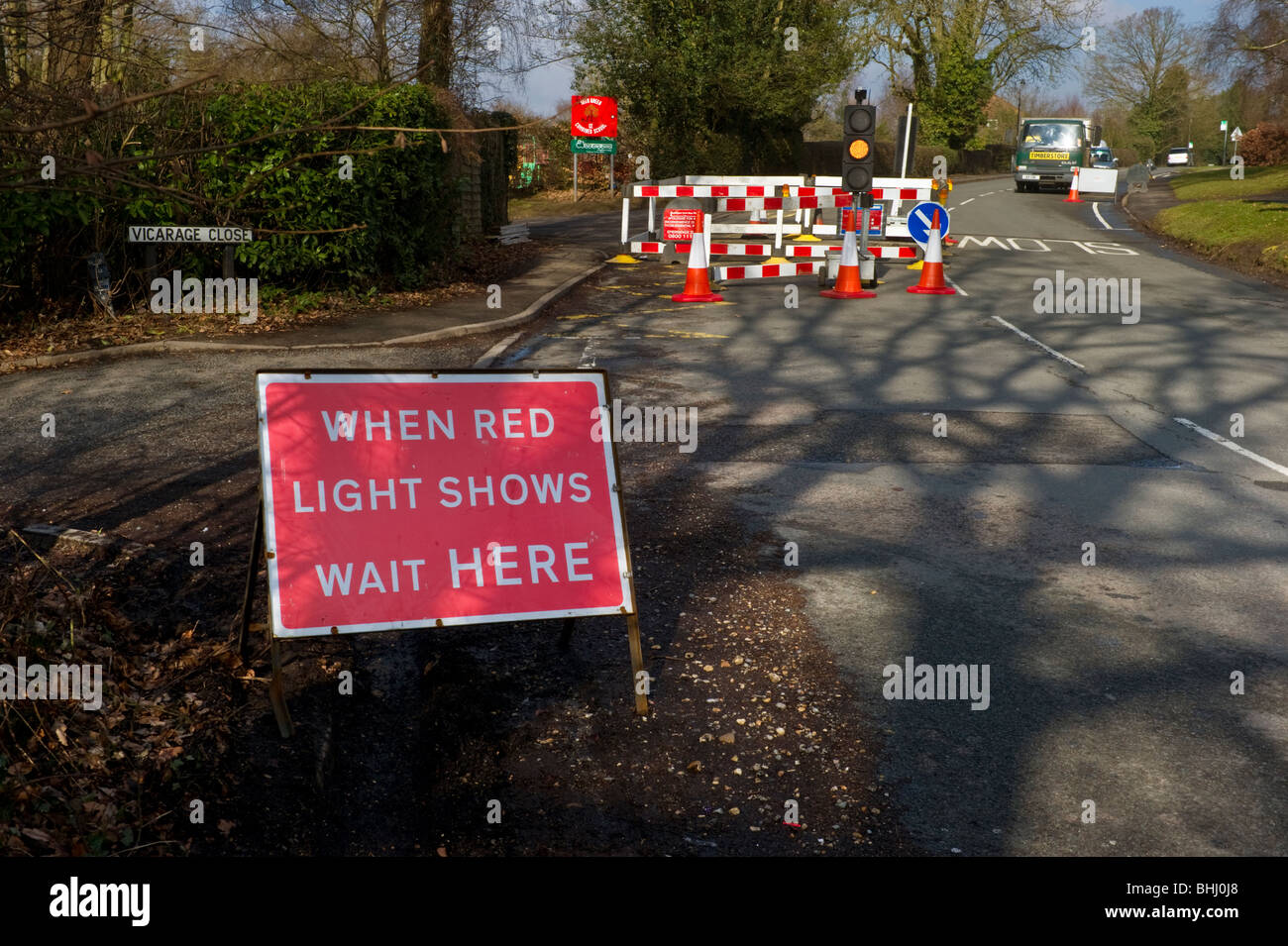 Road works sign, temporary traffic lights in Seer Green Buckinghamshire ...