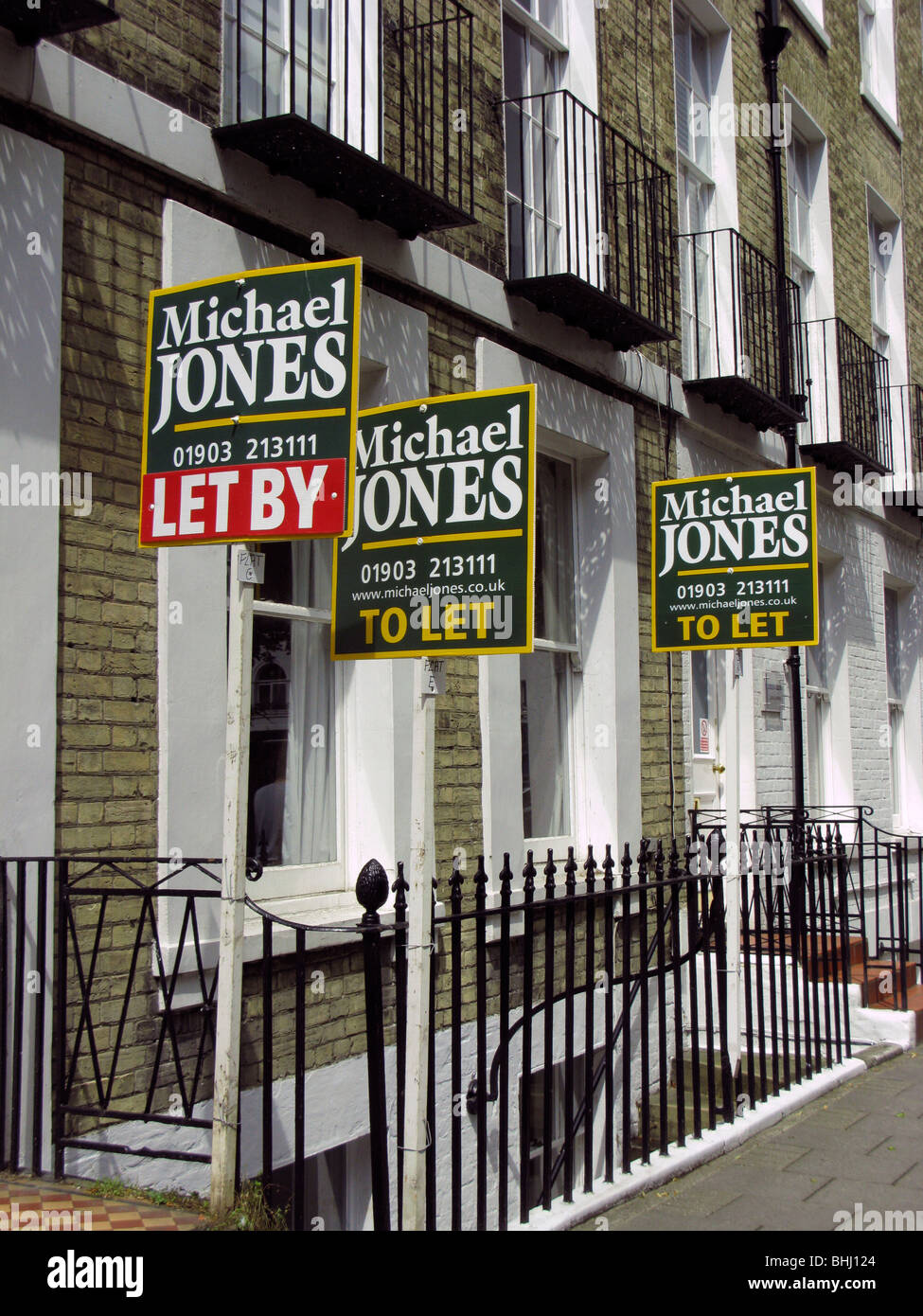 Row of estate agent boards hi-res stock photography and images - Alamy