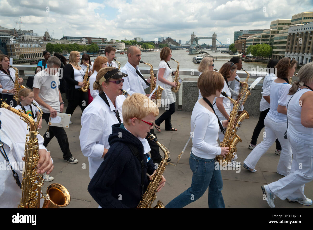 Saxophonists cross London Bridge playing 'Leviathan', a musical work ...