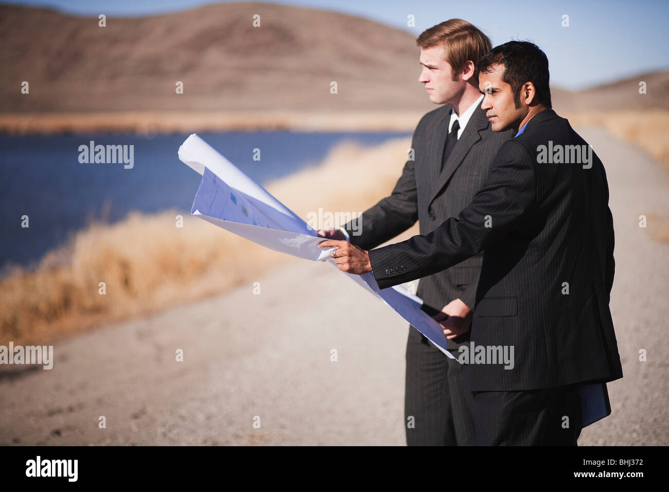 2 men in water hi-res stock photography and images - Alamy