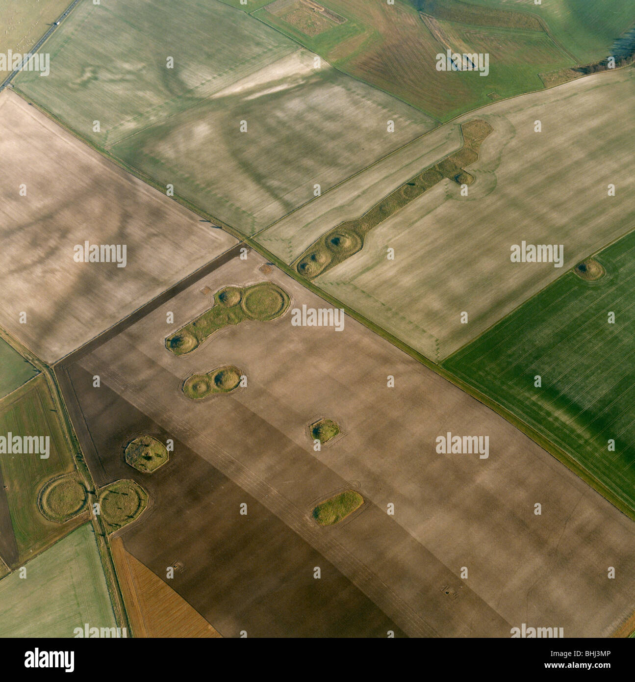Aerial view showing the remains of barrows in the landscape around ...