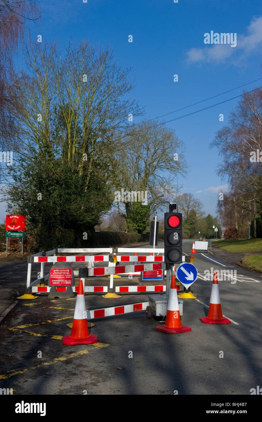 Temporary traffic lights,cones and barriers at roadworks in Seer Green ...