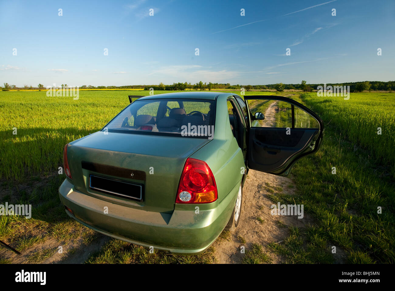 Car stopped on a country side road Stock Photo - Alamy