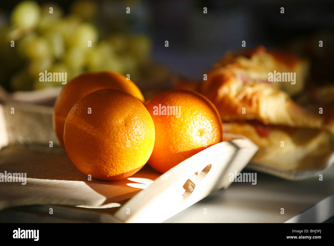Oranges on a table Stock Photo - Alamy