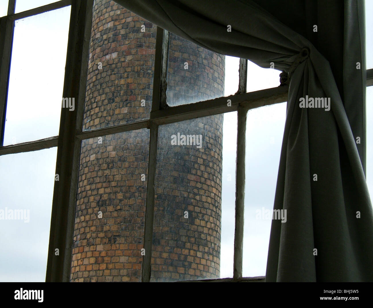View of a brick chimney through a window Stock Photo - Alamy