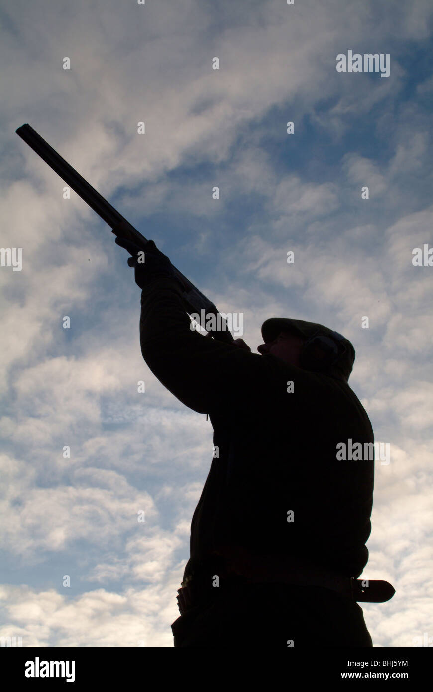 A man aiming his gun Stock Photo - Alamy