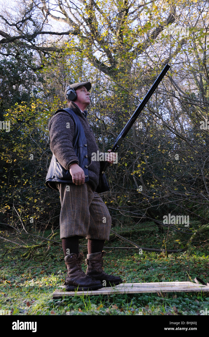 A man with a gun Stock Photo - Alamy
