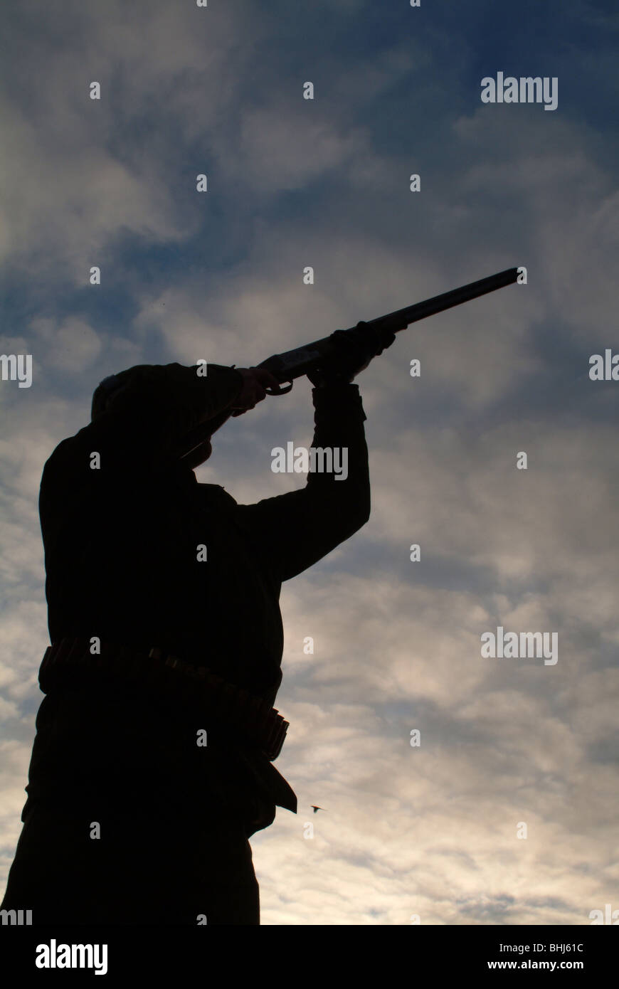 A man aiming his gun Stock Photo - Alamy