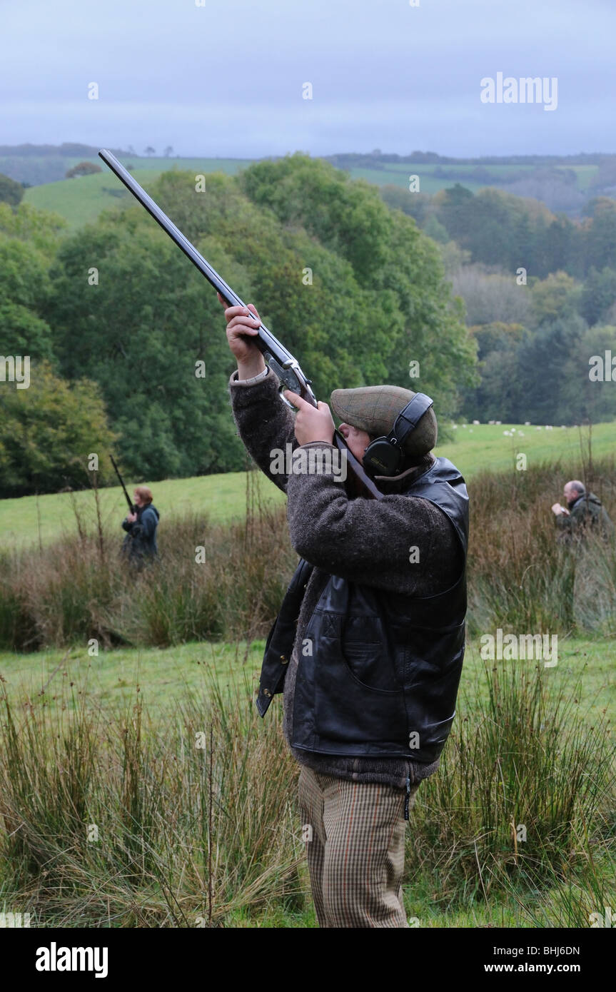 A man shooting a gun Stock Photo - Alamy