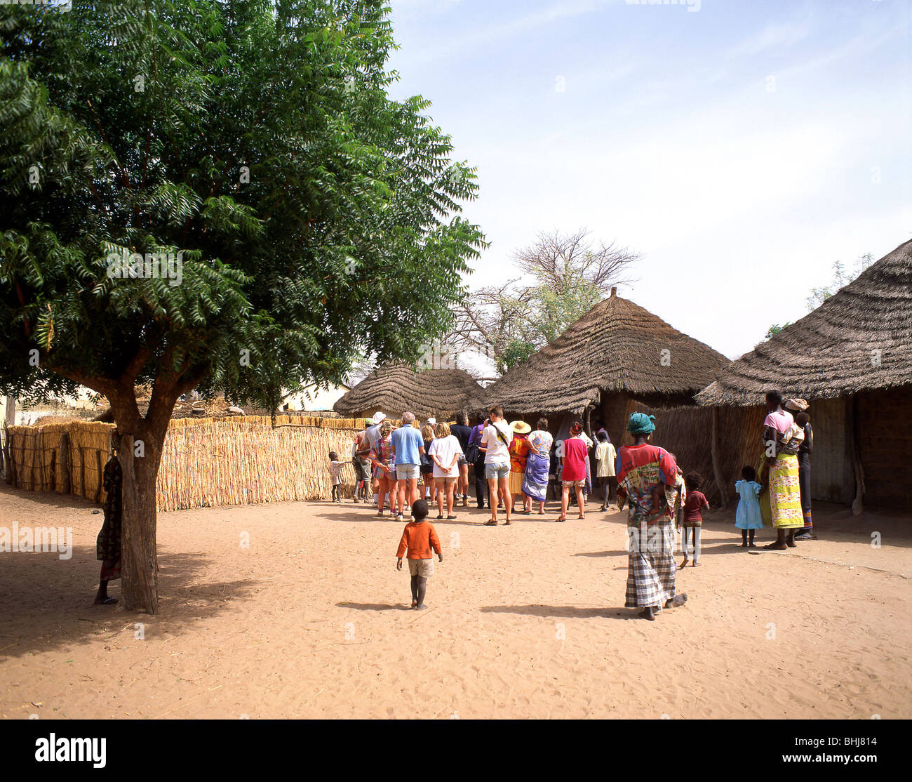 Tourists visiting local village, Saloum Delta National Park, Senegal ...