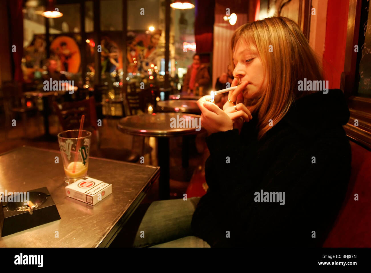 Horizontal photo customer smoking in a parisian bar hi-res stock ...