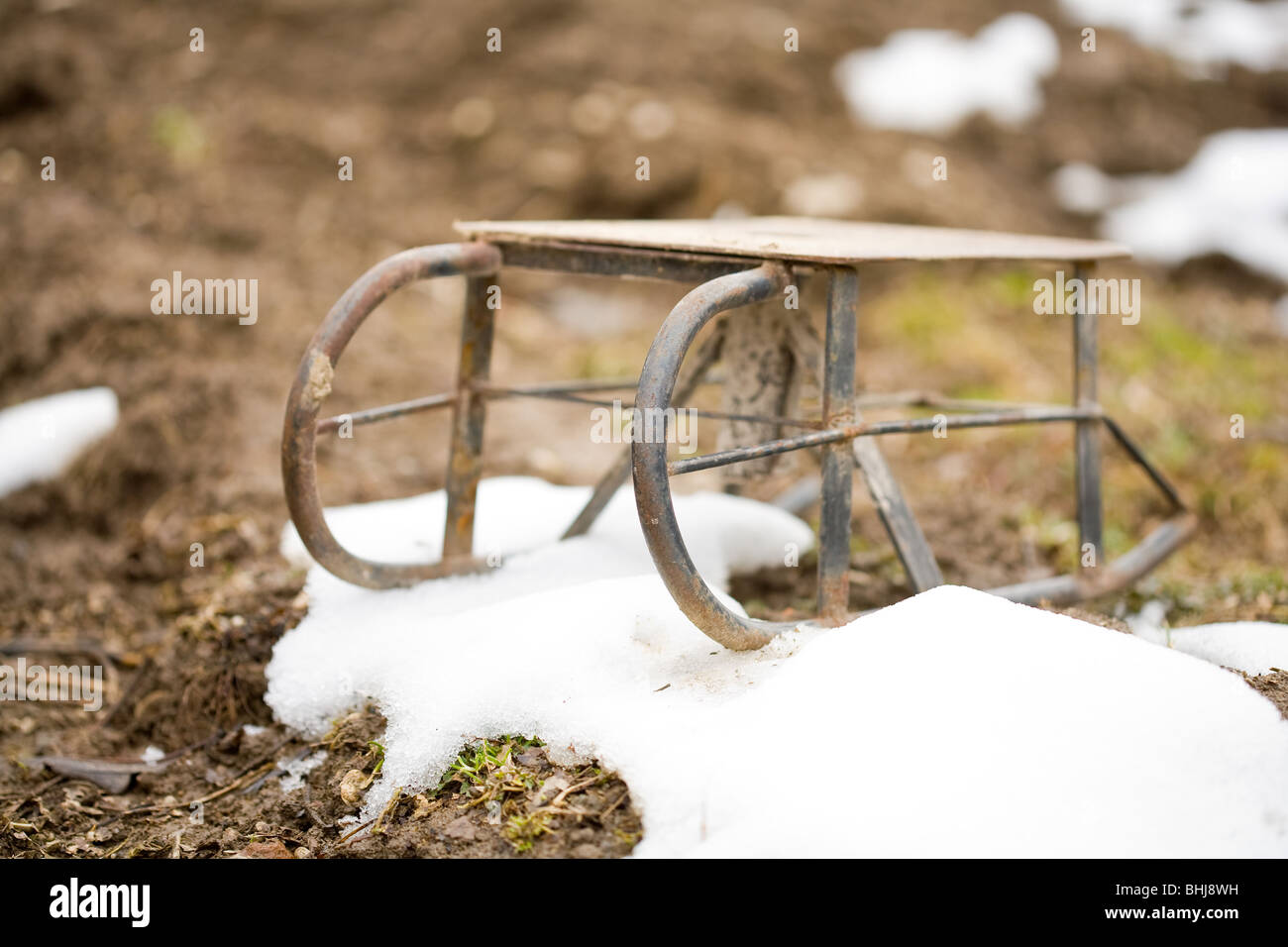 Abandoned rusty sledge - spring is coming Stock Photo - Alamy