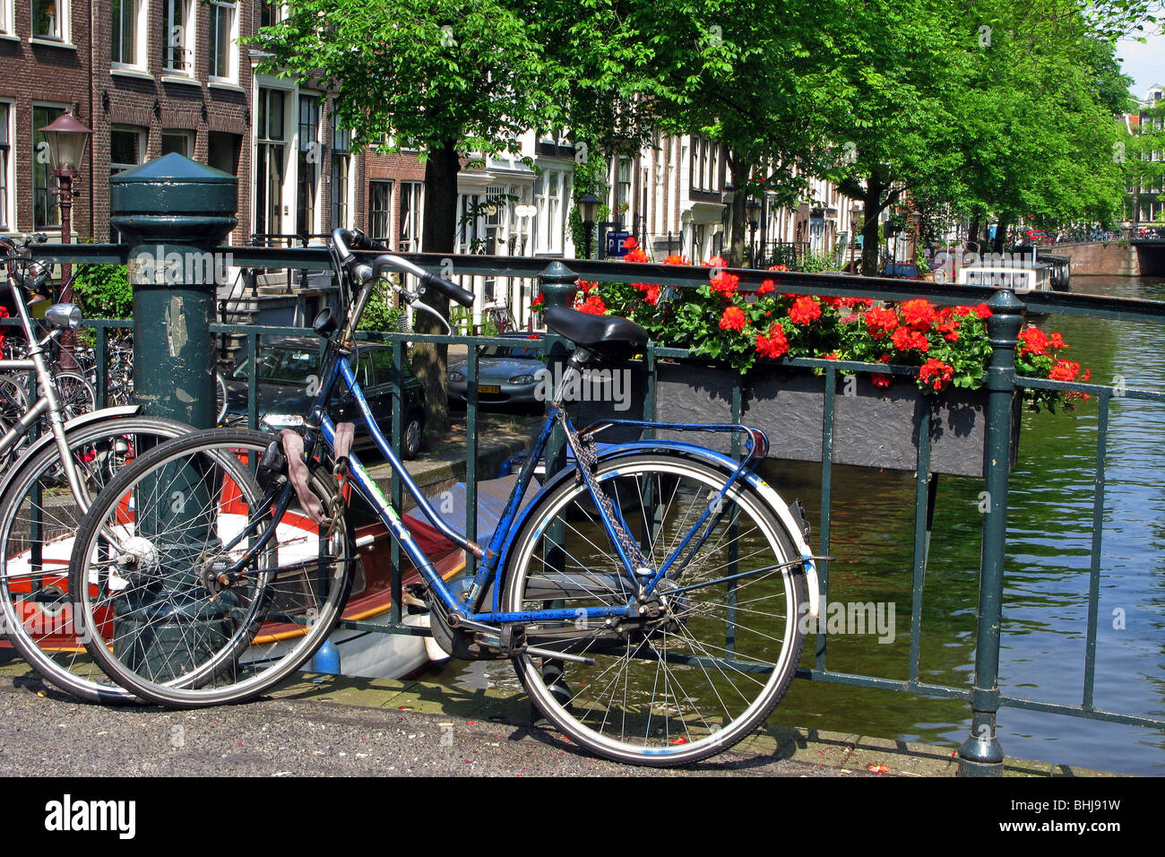 Typical dutch bikes on a bridge over a canal hi-res stock photography ...