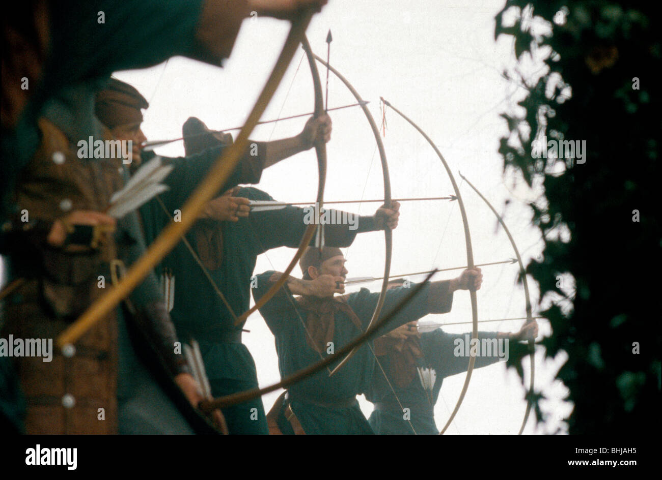 Archers in a battle re-enactment. Artist: Geoffrey Davis Stock Photo ...