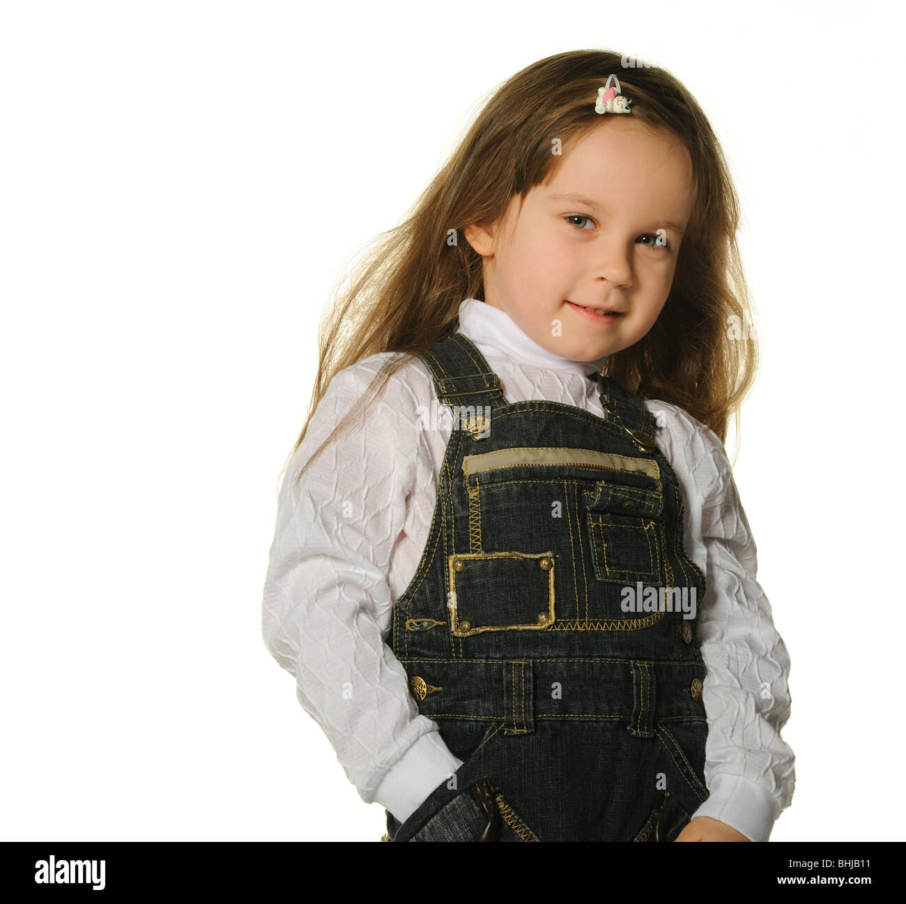 Portrait of the pretty little girl. It is isolated on a white ...