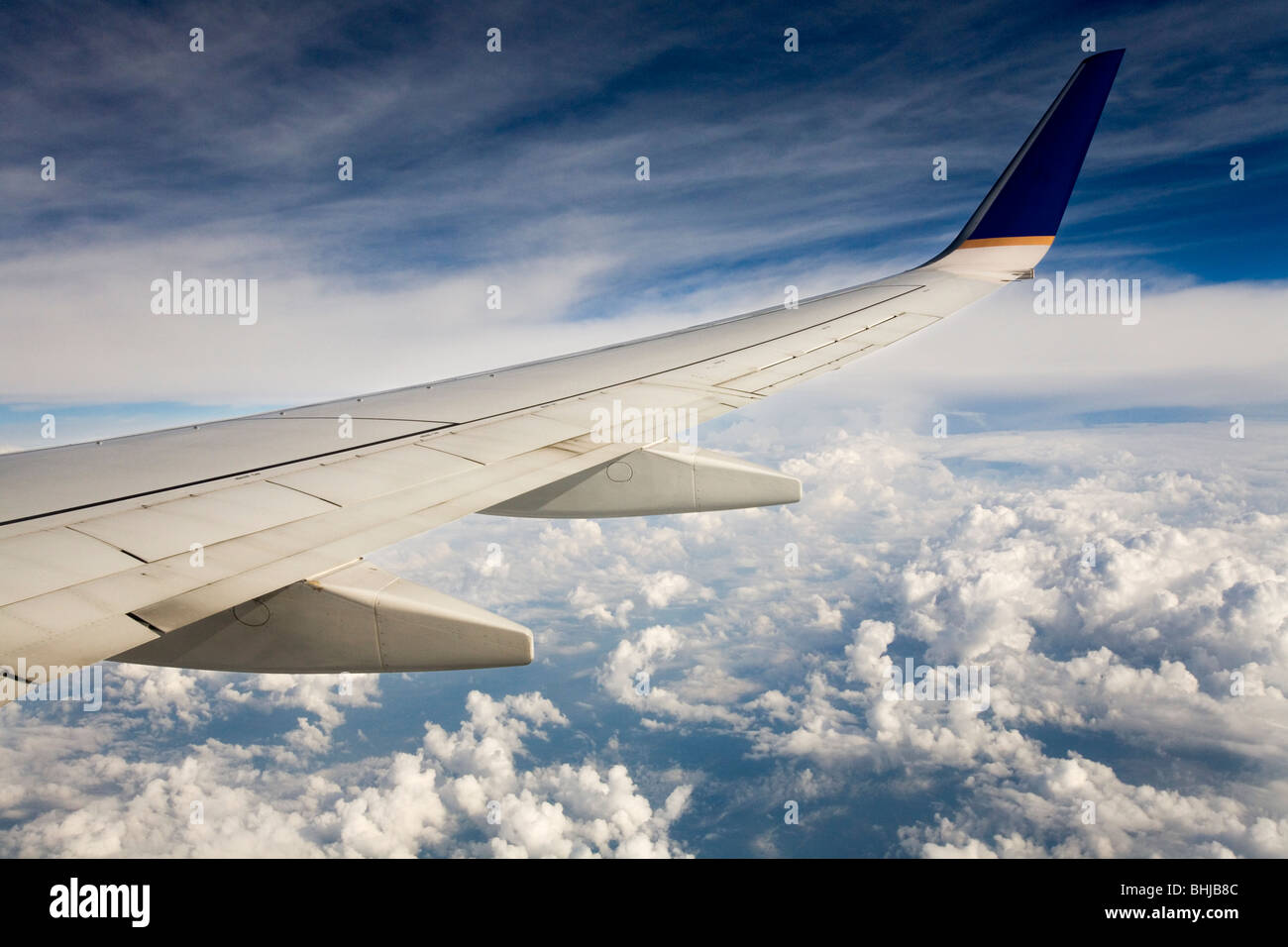 Looking out on the wing of a jet plane in flight Stock Photo - Alamy