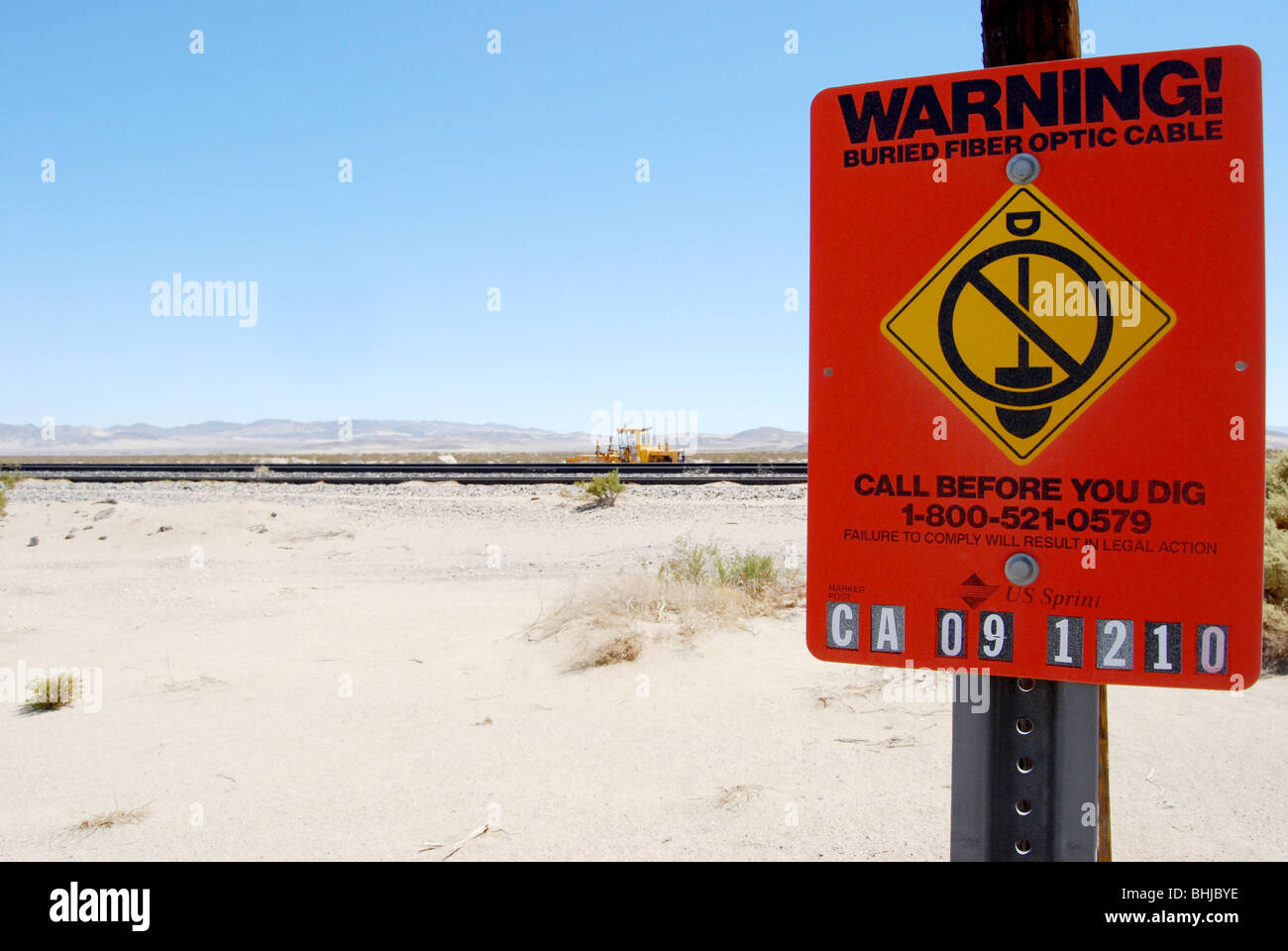 warning sign at railroad crossing about underground digging Stock Photo ...