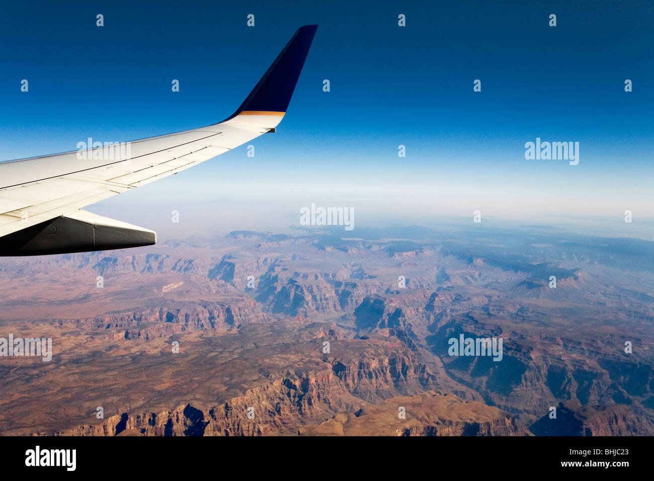 Looking out on the wing of a jet plane in flight Stock Photo - Alamy