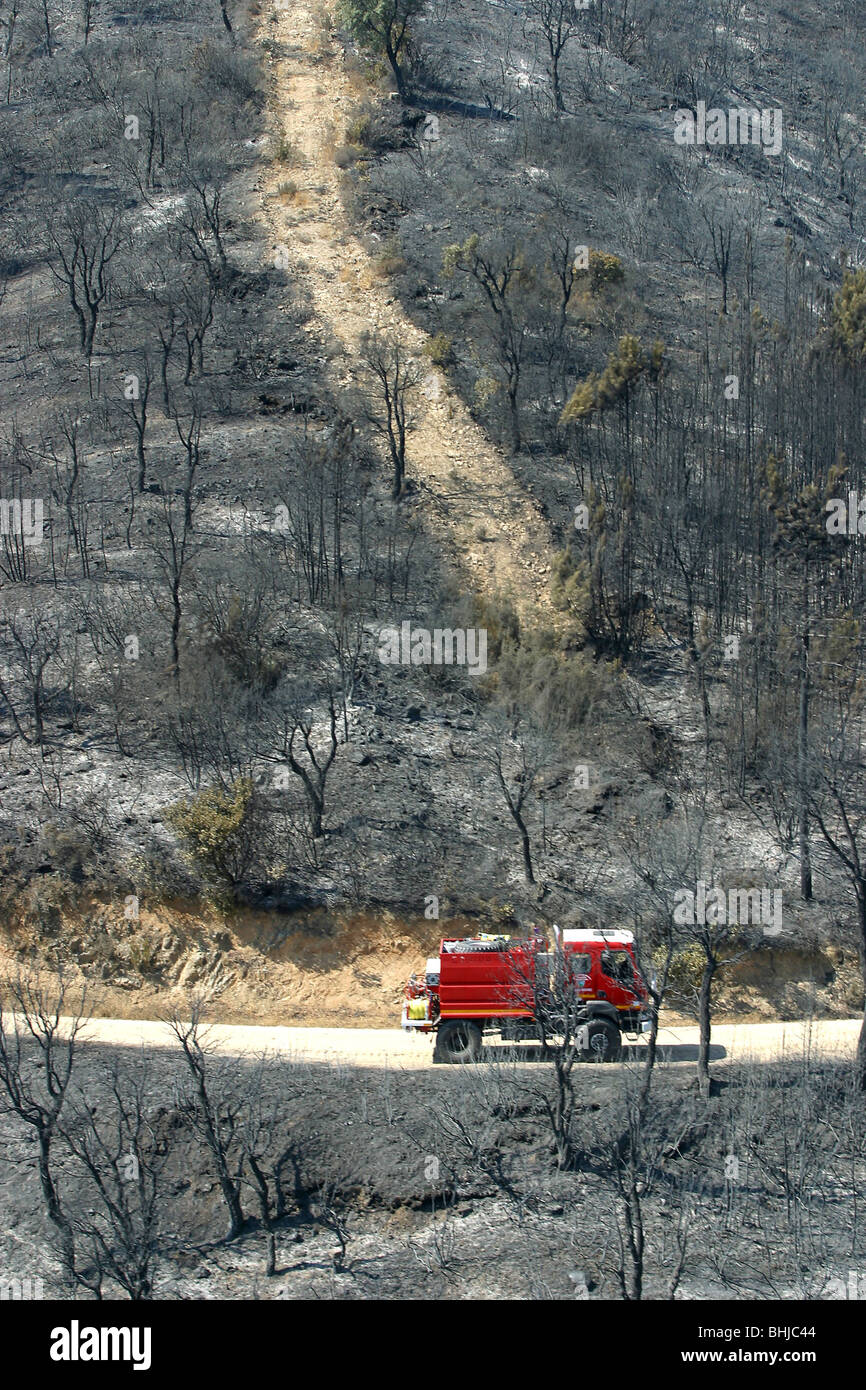 FOREST FIRE TANKER ON A FOREST FIRE PROTECTION TRAIL, FOREST FIRE IN ...