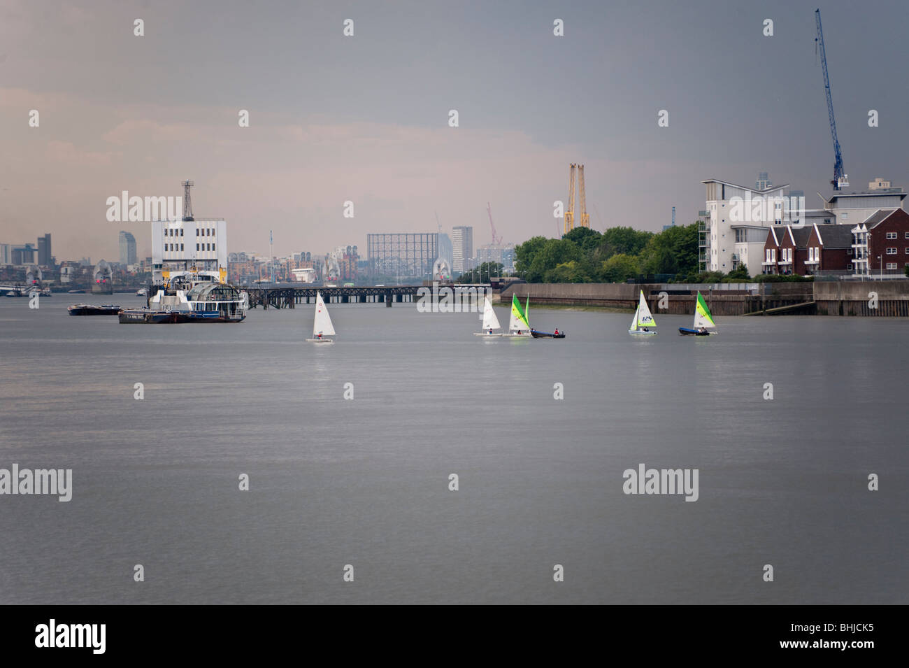 View upstream along River Thames from Woolwich towards Thames Barrier ...
