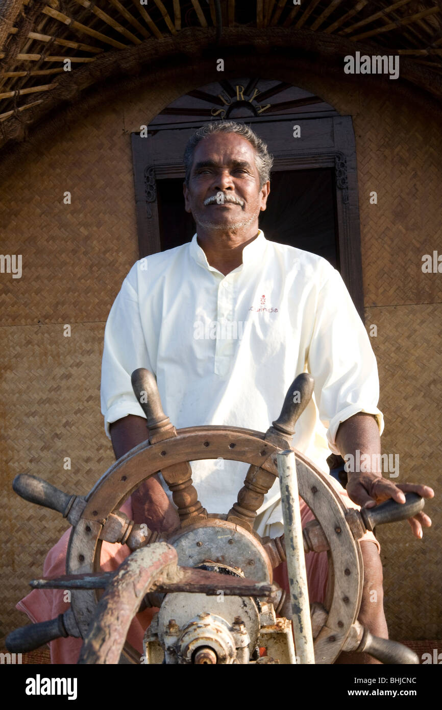 Kerala southern india backwater houseboat trip captain Stock Photo - Alamy