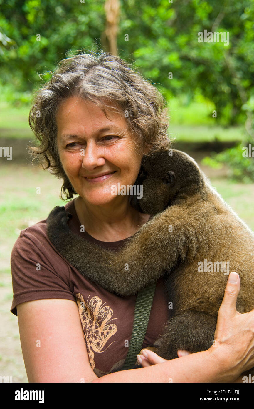 A monkey hugging a tourist in the Amazon area of Peru Stock Photo - Alamy