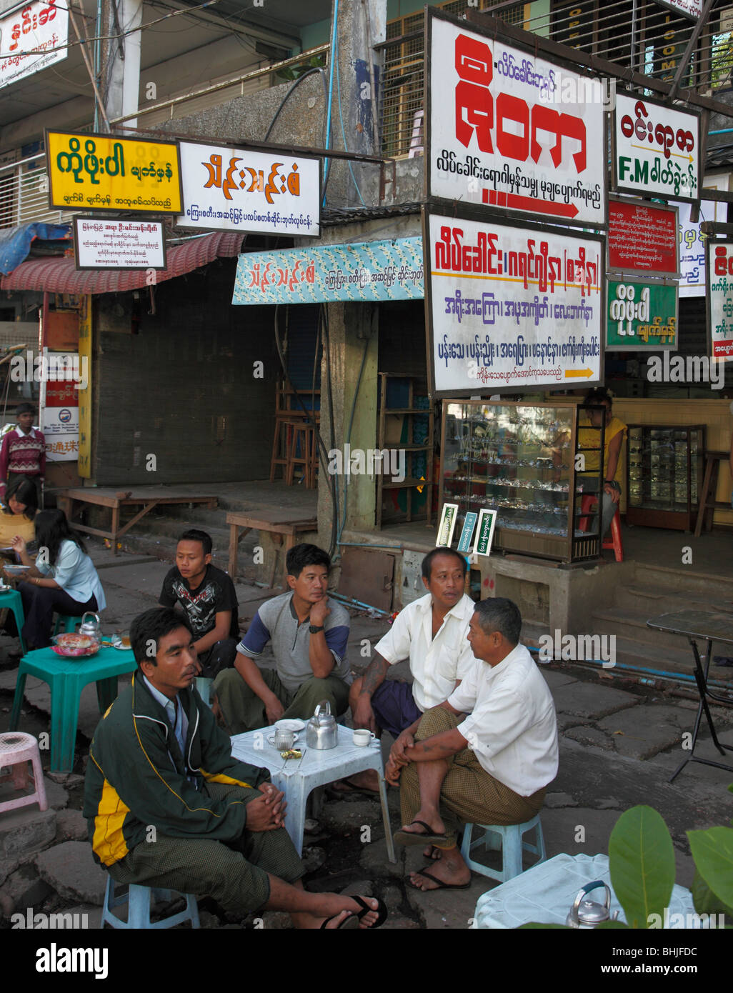 Myanmar, Burma, Yangon, Rangoon, street scene, tea stall, shops, people ...