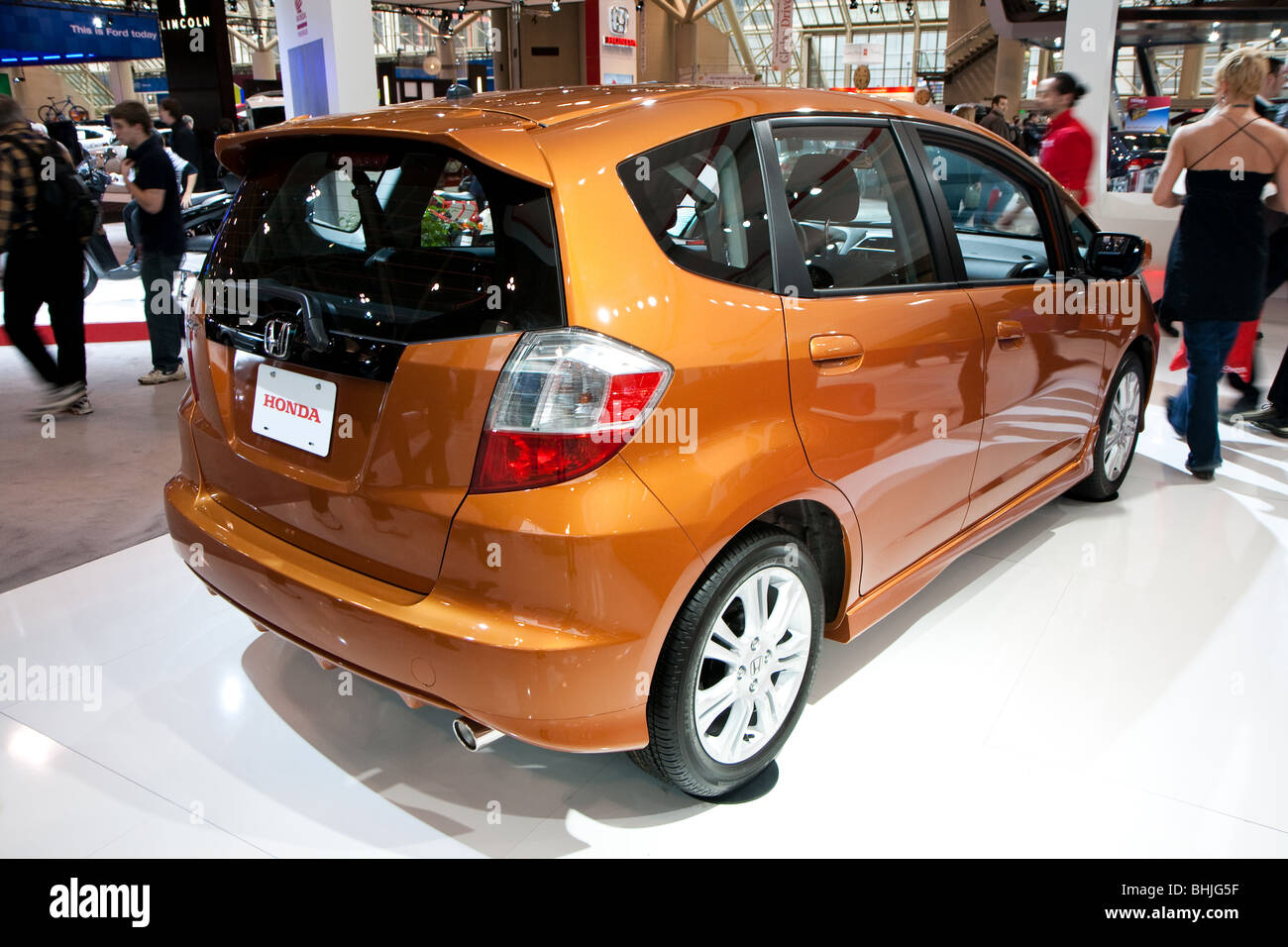 "Honda Fit" subcompact car orange Stock Photo - Alamy