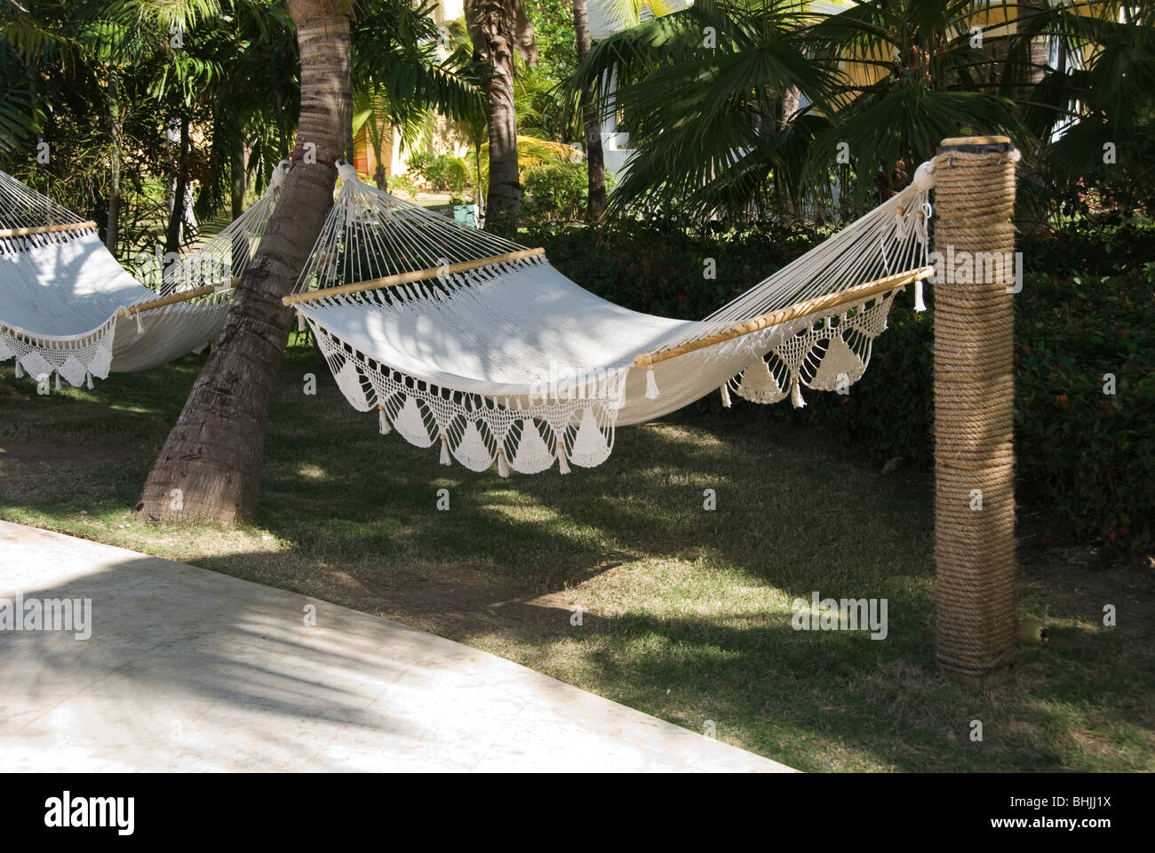 Holiday hammock by the pool Stock Photo - Alamy