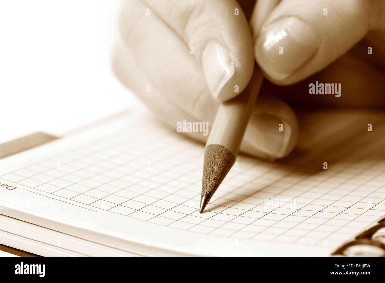 Female hand writing Stock Photo - Alamy